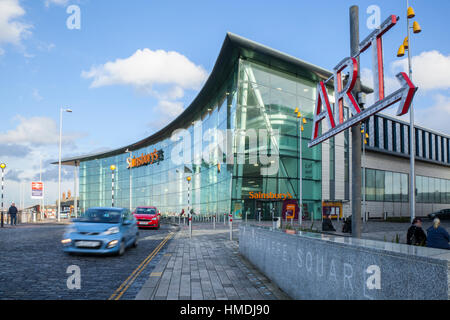 People passing Sainsbury's supermarket, a new Modern Glass fronted ...