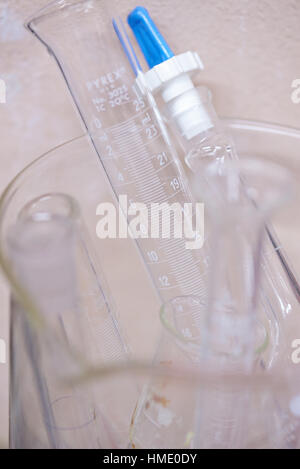 Clean empty laboratory glassware isolated on white Stock Photo - Alamy