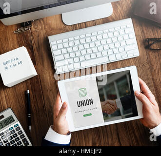 Union word on business handshake background Stock Photo - Alamy
