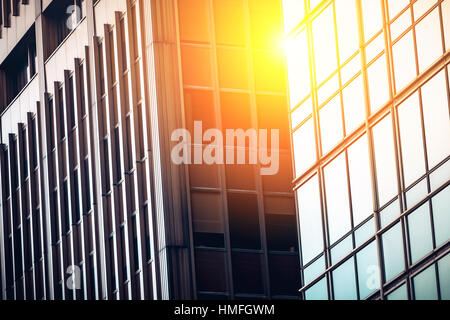 Modern office building with sun ray reflection from corner Stock Photo ...