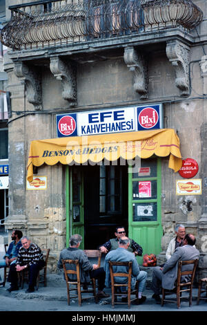 Middle-Aged Turkish Cypriot Men Drink Tea Outside a Traditional Turkish ...