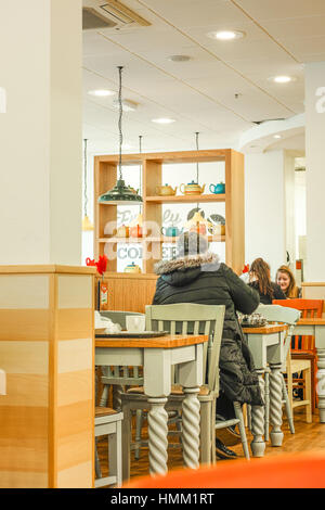 Tables and chairs at the Morrisons cafe in Corby, England Stock Photo ...