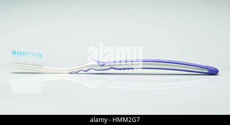 Tooth brush on white background Stock Photo - Alamy