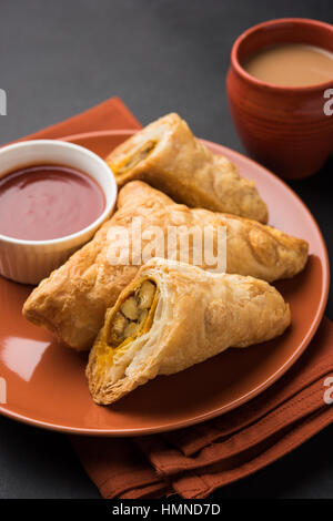 stuffed vegetable or veg puff or puf or samosa, famous indian snack ...