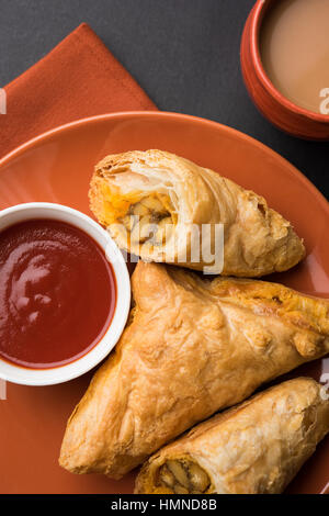 stuffed vegetable or veg puff or puf or samosa, famous indian snack ...