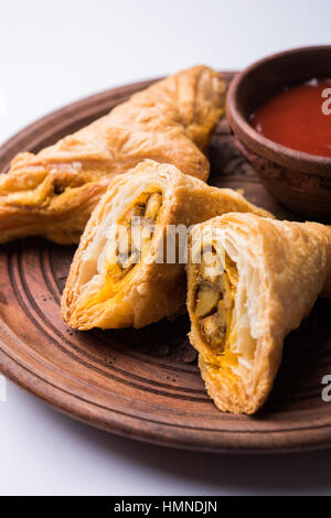 stuffed vegetable or veg puff or puf or samosa, famous indian snack ...