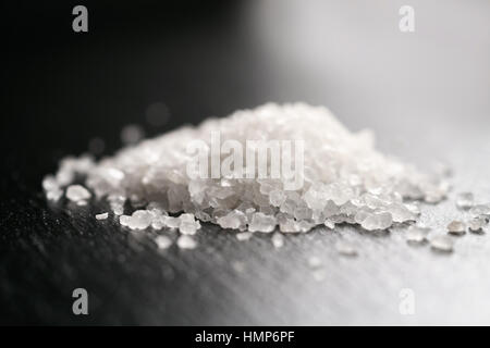coarse sea salt on slate background Stock Photo - Alamy