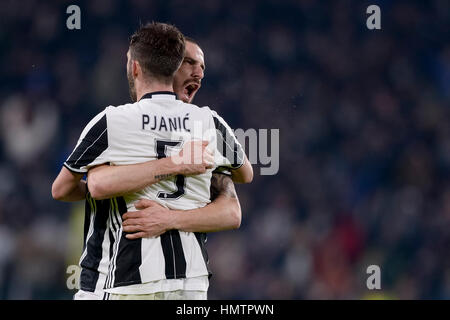 Miralem Pjanic and Leonardo Bonucci of Juventus celebrate at the end of ...