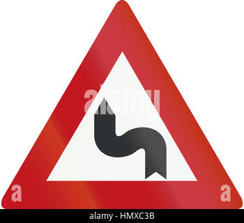 Double bend first to left road sign on white background Stock Photo - Alamy
