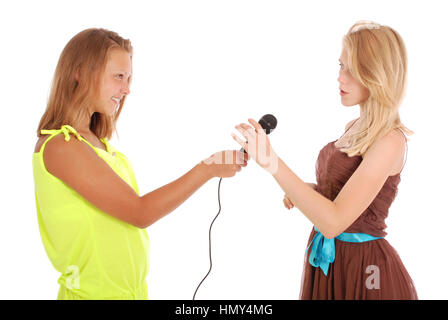 Young beautiful teenage girl conducts interviews with the singer ...