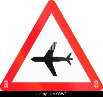 Warning sign used in Switzerland - left turn Stock Photo - Alamy