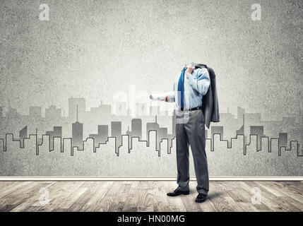 Headless engineer man with papers in hand against sketched background ...