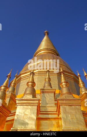 Golden Ancient Chedi building in Thailand Stock Photo - Alamy