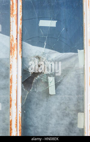 Accident cracked damaged broken house window glass Stock Photo - Alamy
