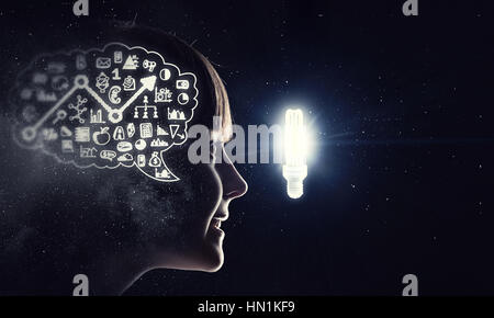 Profile of dreaming kid girl against night city background Stock Photo ...