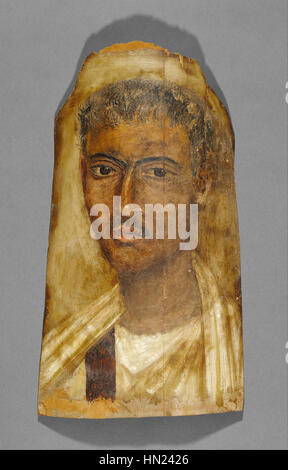 Egypt: Mummy portrait of a young man in Roman clothing, probably from ...