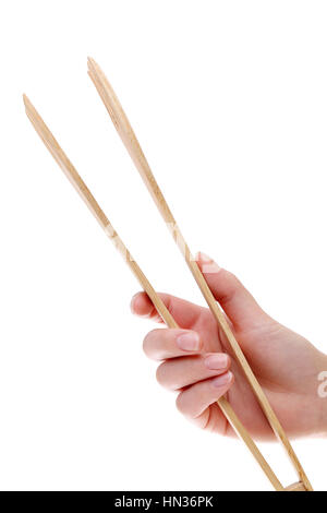 Hand holding kitchen tongs isolated on white background with clipping ...