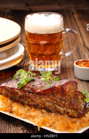 Grilled pork ribs with herbs Stock Photo - Alamy