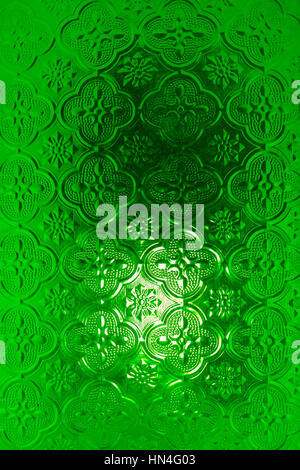 green color glass with thai pattern Stock Photo - Alamy