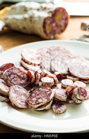Tasty sliced salami with white mold Stock Photo - Alamy