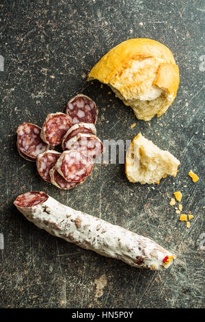 Tasty sliced salami with white mold Stock Photo - Alamy