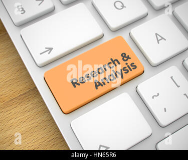 Keyboard with Investigation Orange Button Stock Photo - Alamy
