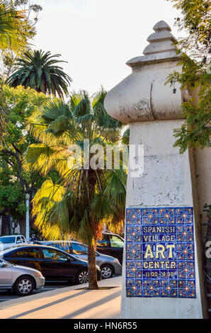 A blue parking sign on column Stock Photo - Alamy