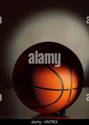 basketball in dramatic lighting with spot light Stock Photo - Alamy