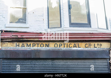 Old shop sign uncovered in Southend on Sea, Essex, UK. Van Looys ...