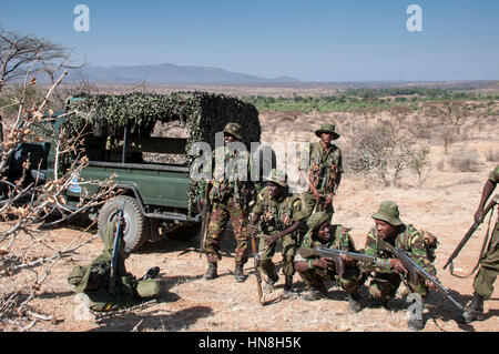 Kenya Wildlife Rangers from the anti poaching unit chase cattle grazing ...