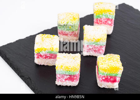 Eastern sweets Turkish delight in color coconut chips Stock Photo - Alamy