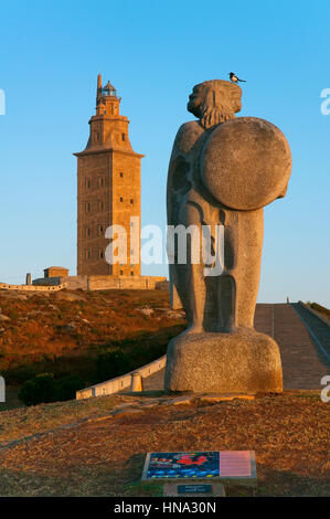 View of stone sculpture of Breogán with The Tower of Hercules (Spain ...
