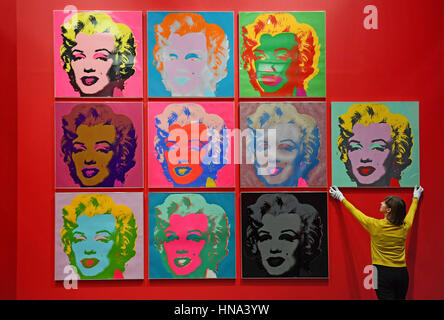 Catherine Daunt, project curator at the British Museum, adjusts one of ...