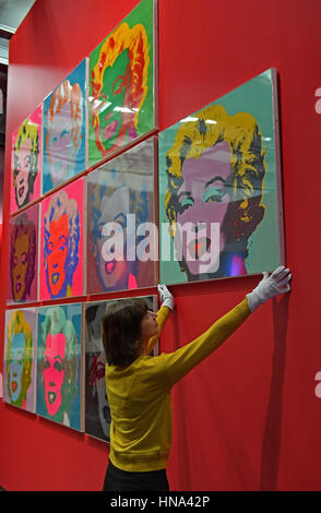 Catherine Daunt, project curator at the British Museum, adjusts one of ...