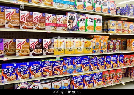 boxes of breakfast cereal on shelves at a grocery store Stock Photo ...