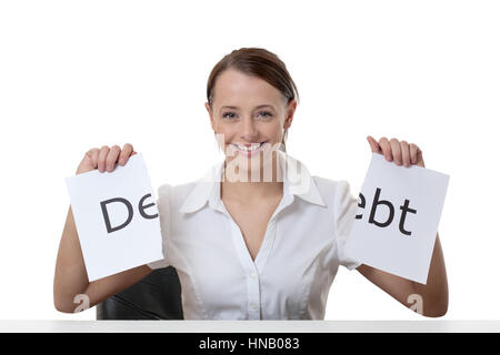 woman holding up a ripped sign with the word credit card debt written ...