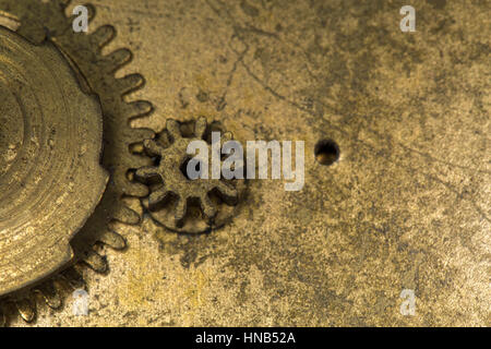 Cogs in a clock Stock Photo - Alamy