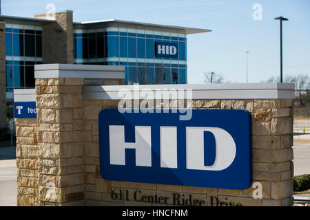 A logo sign outside of the headquarters of HID Global in Austin, Texas ...