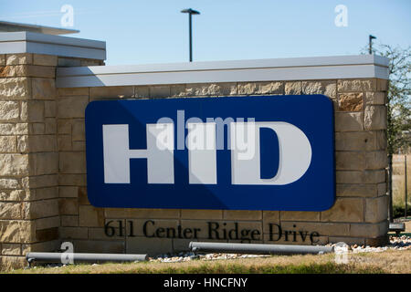 A logo sign outside of the headquarters of HID Global in Austin, Texas ...