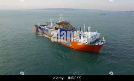 Loaded on the semi-submersible platform ship Transshelf, the body of ...