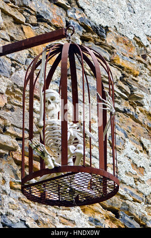 Skeleton in a cage Stock Photo - Alamy