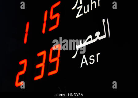 Electronic display board showing Prayer times in a Mosque Stock Photo ...