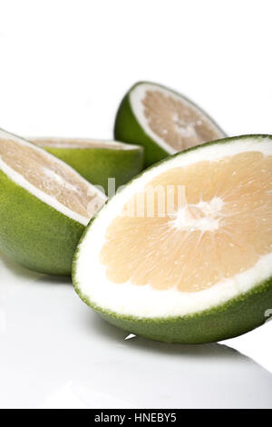 Fresh juicy grapefruits Isolated on white background Stock Photo - Alamy