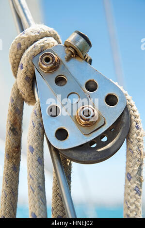 Close-up of a block and tackle pulley system for lifting heaving crates ...