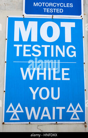 MOT Vehicle Testing Centre sign including diesel emissions testing, UK ...