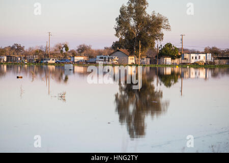 Newman, CA, USA. 12th Feb, 2017. A group of people ride in a row boat ...