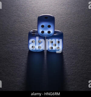 Trio of blue translucent gaming dice Stock Photo - Alamy