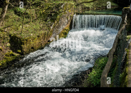 Semicircular dam with small lake that cause waterfall 01 Stock Photo ...