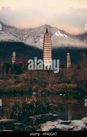Ancient pagoda in Dali old town with snow capped Mt Cangshan, Yunnan ...