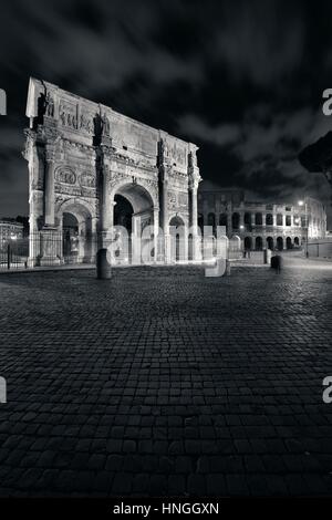Arch of Constantine and Colosseum at night in Rome, Italy Stock Photo ...
